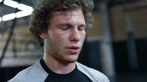 Sweat drop falling from fighter face in ... | Stock Video | Pond5