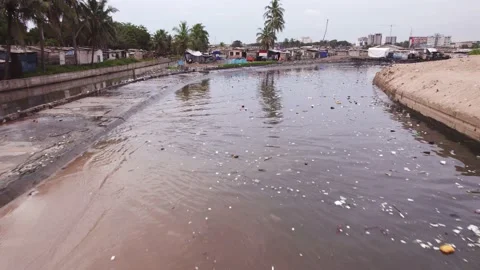 Sweeping Aerial of Polluted Lagoon by Sl... | Stock Video | Pond5