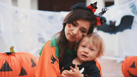 Sweet unhappy boy in skeleton costume cr... | Stock Video | Pond5