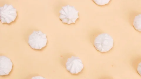 Sweets on a beautiful pastel yellow surf... | Stock Video | Pond5