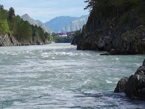 Swift water flow in mountain river with ... | Stock Video | Pond5
