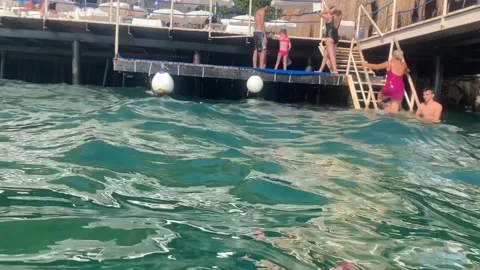 swiming at Belem beach in Antalya Lara | Stock Video | Pond5