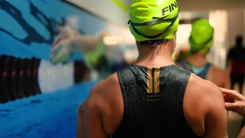 swimmers out of the pool before entering... | Stock Video | Pond5