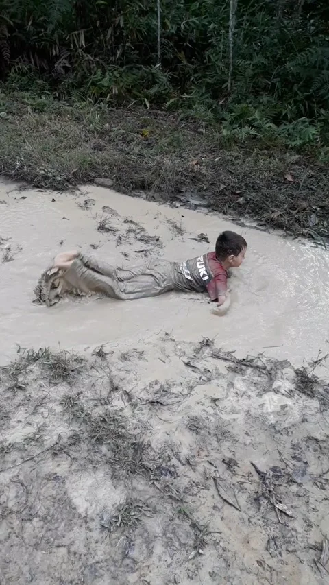 Swimming a Mud Puddle Marathon, Blumenau... | Stock Video | Pond5