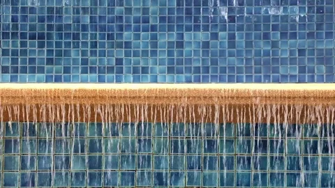 A swimming pool with running water on th... | Stock Video | Pond5