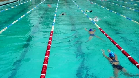 Swimming pool training. Athletes practic... | Stock Video | Pond5