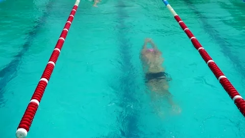 Swimming pool training. Athletes practic... | Stock Video | Pond5