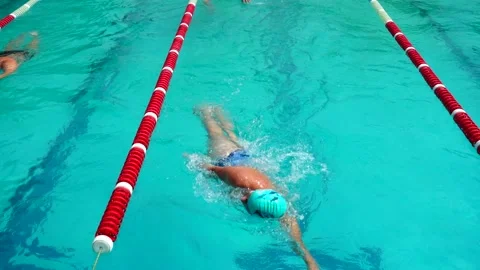 Swimming pool training. Athletes practic... | Stock Video | Pond5