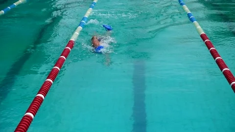 Swimming pool training. Athletes practic... | Stock Video | Pond5