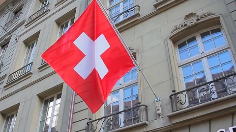 Swiss flag waving on a building in Bern,... | Stock Video | Pond5