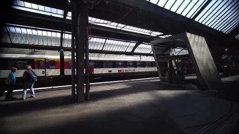 Swiss train platform, train departing fr... | Stock Video | Pond5