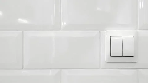 Switch buttons in white kitchen interior | Stock Video | Pond5