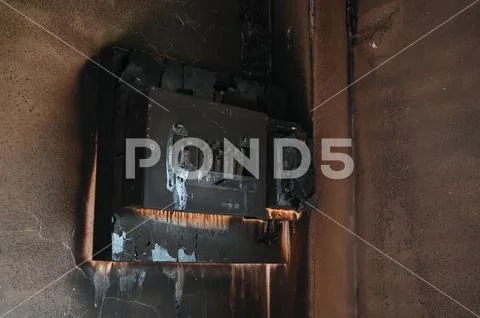 Switchboard electricty burn on brick wall texture background Stock ...