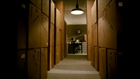 A switchboard operator speaks to man in ... | Stock Video | Pond5