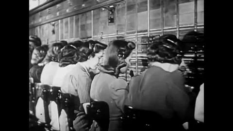 Switchboard operators are shown working ... | Stock Video | Pond5
