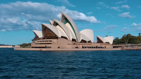 Sydney Opera House with blue water and s... | Stock Video | Pond5