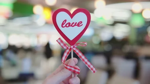 Symbol of love is a heart-shaped stick i... | Stock Video | Pond5