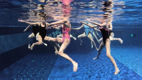 Synchronized swimming junior team underw... | Stock Video | Pond5