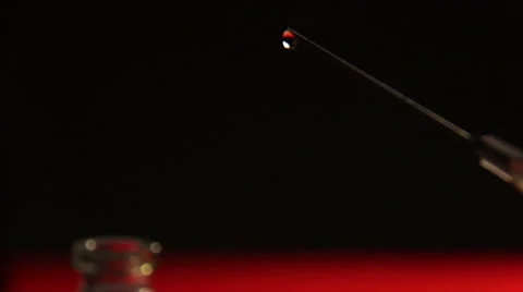 syringe drugs red black background | Stock Video | Pond5