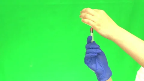 syringe with medicine on a green screen | Stock Video | Pond5