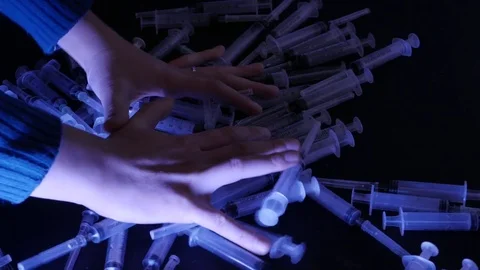 Syringes. Drug addiction concept. 4K UHD | Stock Video | Pond5