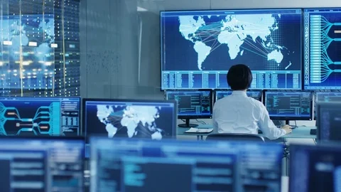 In the System Control Room Operator Sits... | Stock Video | Pond5