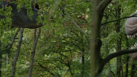 T REX Dinosaurs in forest Jurassic Park | Stock Video | Pond5