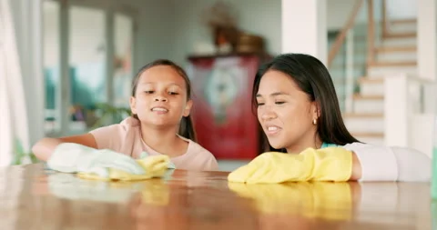 Table, cleaning and mother with girl chi... | Stock Video | Pond5