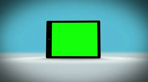 Tablet with green screen on changing bac... | Stock Video | Pond5