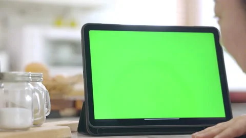 Tablet with green screen chroma key . In... | Stock Video | Pond5
