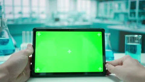 Tablet with Green Screen on Research Bio... | Stock Video | Pond5