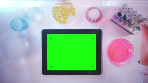 Tablet PC with a Green Screen in the Lab... | Stock Video | Pond5