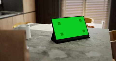 Tablet place on table, Green screen | Stock Video | Pond5