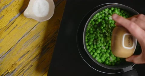 Tabletop food cooking: chef stirs the bo... | Stock Video | Pond5