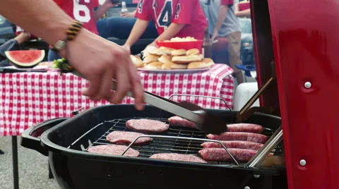 Tailgate: Man Cooking Meat On Grill For ... | Stock Video | Pond5