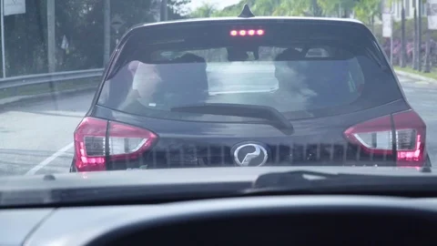 Tailing car hard brake and hazard lights... | Stock Video | Pond5