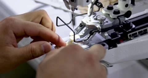 Tailor sewing button on electric sewing ... | Stock Video | Pond5