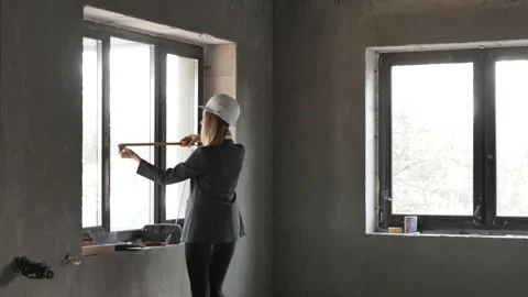 take measurements in the process of buil... | Stock Video | Pond5