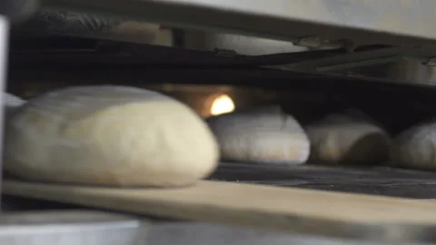 Take out the finished bread from the ove... | Stock Video | Pond5