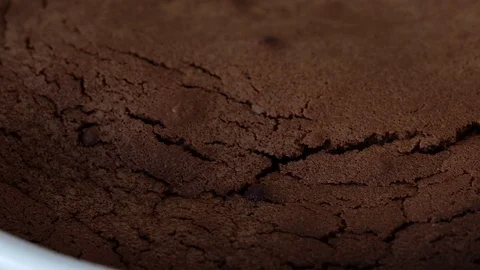 Taking cake out of oven for cooling, it ... | Stock Video | Pond5