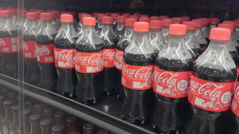 Taking Coca Cola drink from shelf of gro... | Stock Video | Pond5