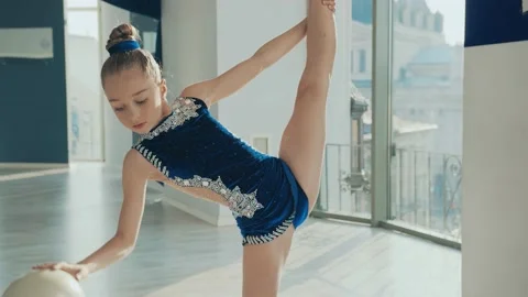 Talented girl gymnast in blue dance dres... | Stock Video | Pond5