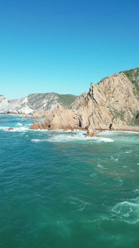 Tall cliffs in the Atlantic Ocean | Stock Video | Pond5