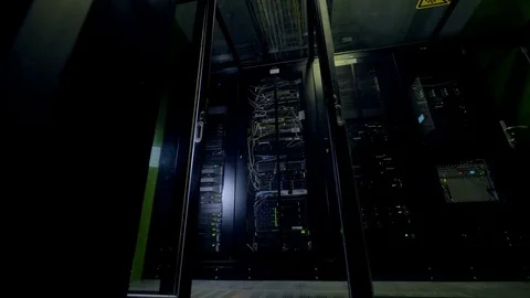 Tall data center cabinets behind a glass... | Stock Video | Pond5
