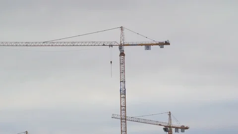 The tallest tower crane on an industrial... | Stock Video | Pond5