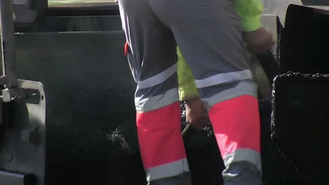 Tamping tarred, Tar Surface Laying Machi... | Stock Video | Pond5