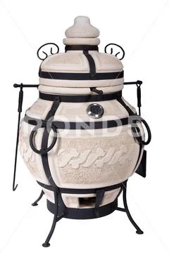 Tandoor with a wood-burning stove close-up photo on a white background ...