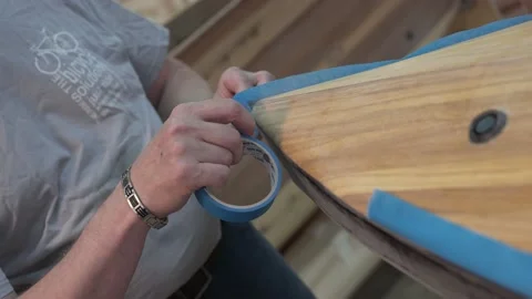 Taping tape perimeter surf Board | Stock Video | Pond5