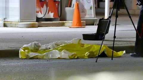 Tarp covering dead body at night with po... | Stock Video | Pond5