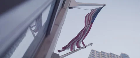 Tattered American Flag Blowing in the Wi... | Stock Video | Pond5